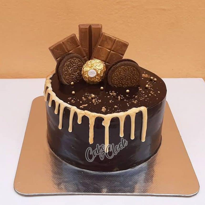 2 tier rainbow cake - Cake O Clock - Best Customize Designer Cakes Lahore